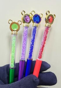 Buy these Cute Crystal filled stone ball point pens for return gifts